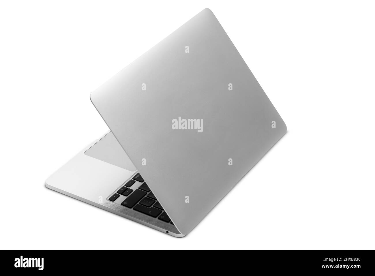 Creative version of an half opened laptop computer on a white ...
