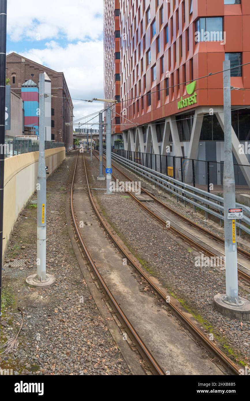 The light rail track running between the Urbanest Darling House ...