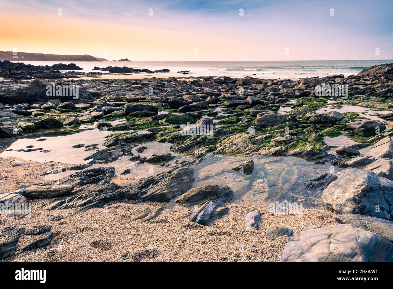 Rocks and rock pools at low tide at the secluded Little Fistral in ...
