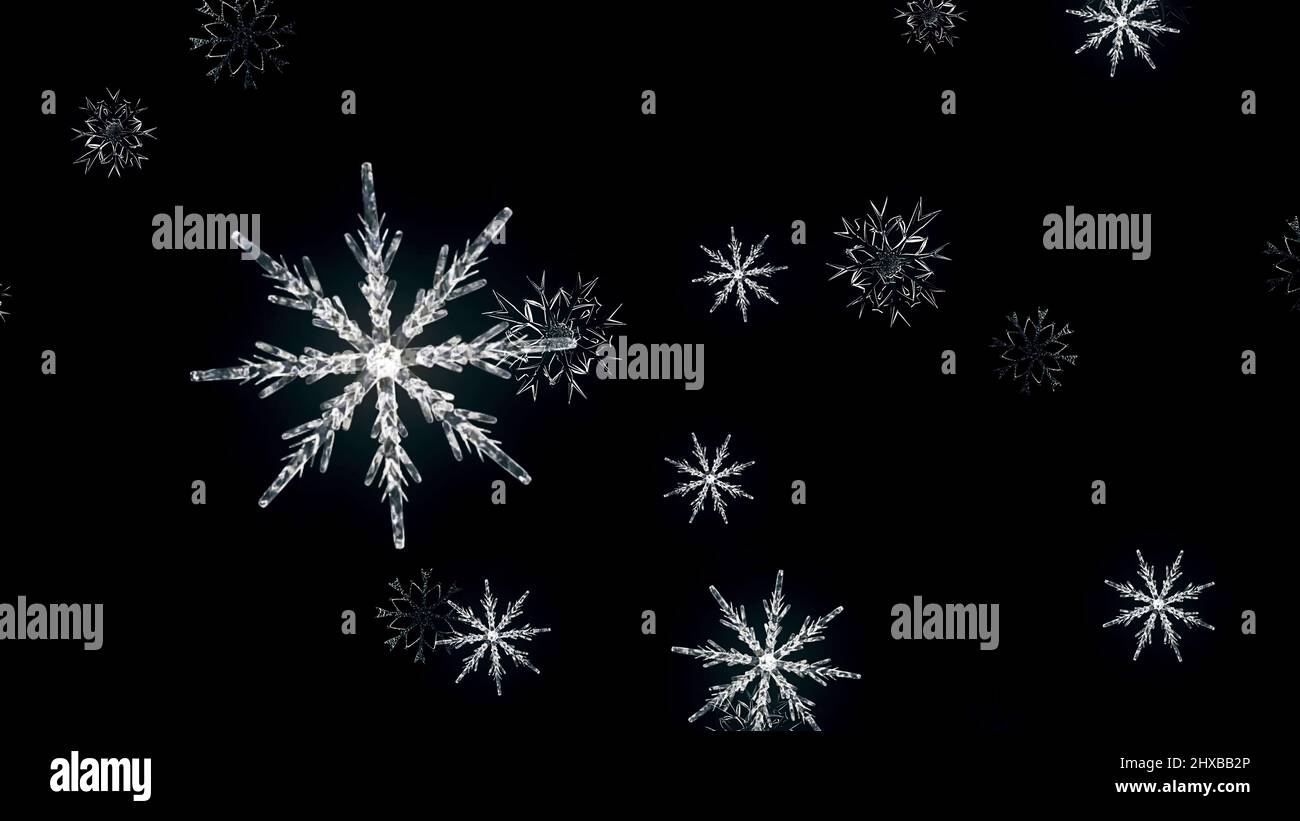 Falling snow flakes video hi-res stock photography and images - Alamy
