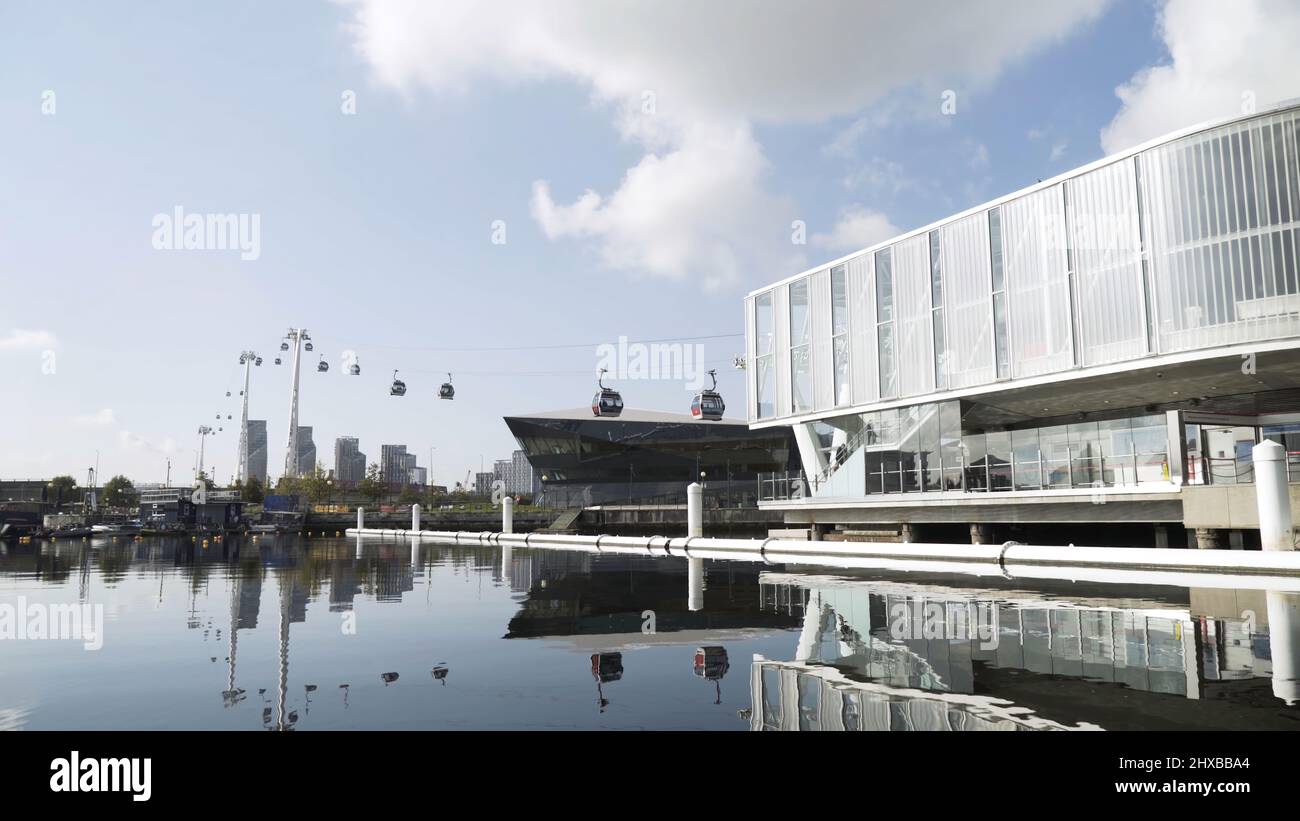 Modern funicular with moving cabins, time lapse effect. Action. Summer ...