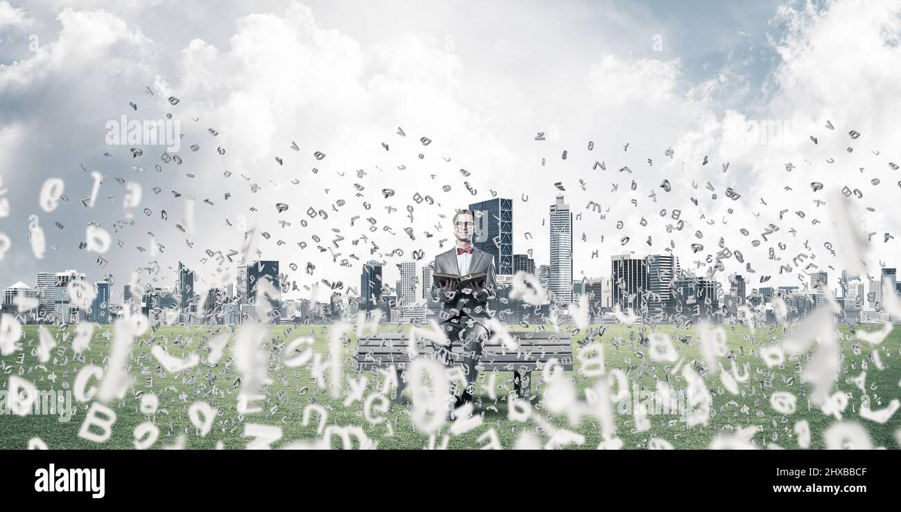 Young businessman or student studying the science and symbols fly ...