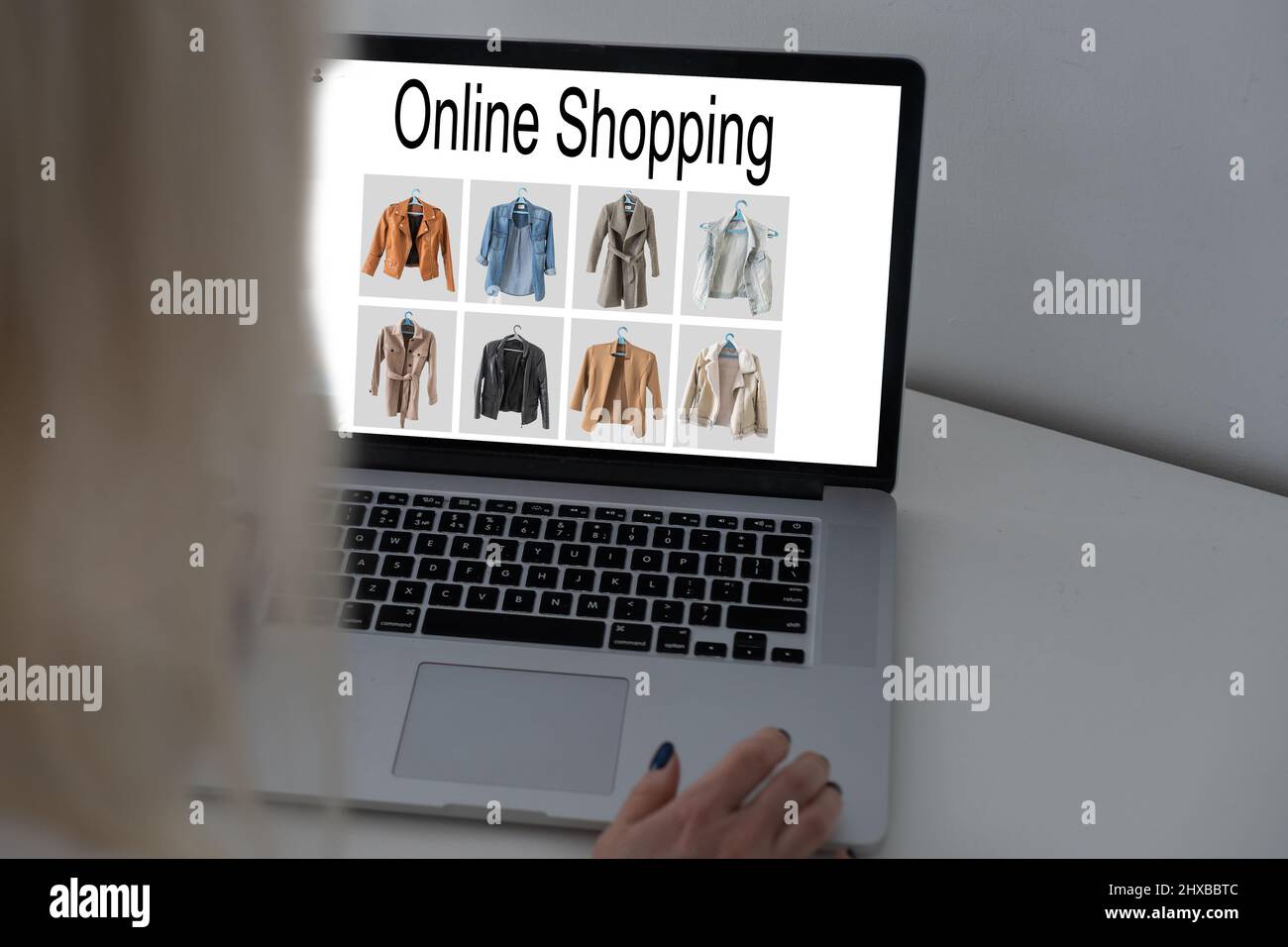 shopping, technology and internet concept: shopping with laptop ...