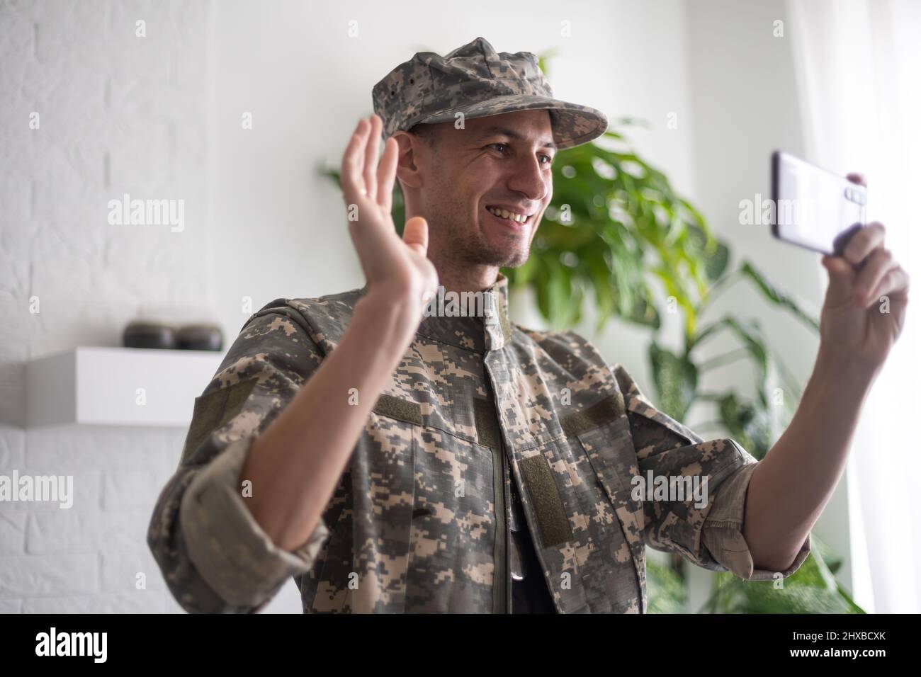 military soldier using mobile phone. letter Stock Photo - Alamy
