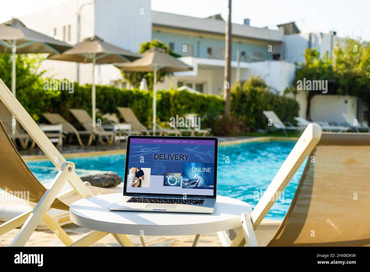 Online shopping. laptop with banner delivery Stock Photo - Alamy