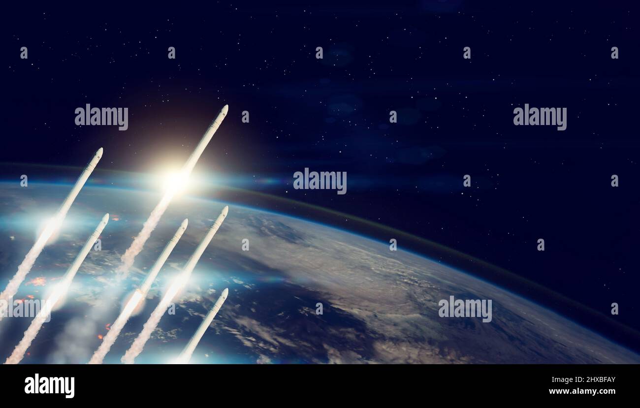 Many rockets in space. Escape from earth concept Stock Photo - Alamy