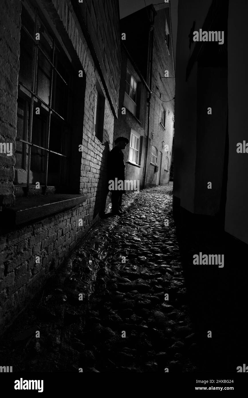 Scary shadow in alley Black and White Stock Photos & Images - Alamy