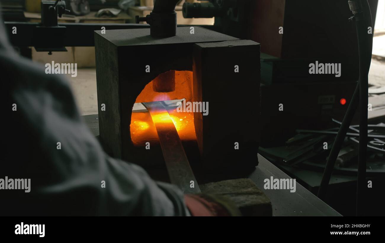 Forge workshop. Smithy manual production. Gas furnace for heating metal ...