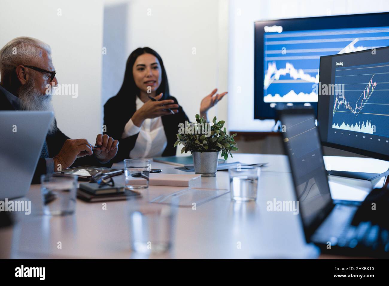 Business trader people talking about new trading strategies inside bank ...
