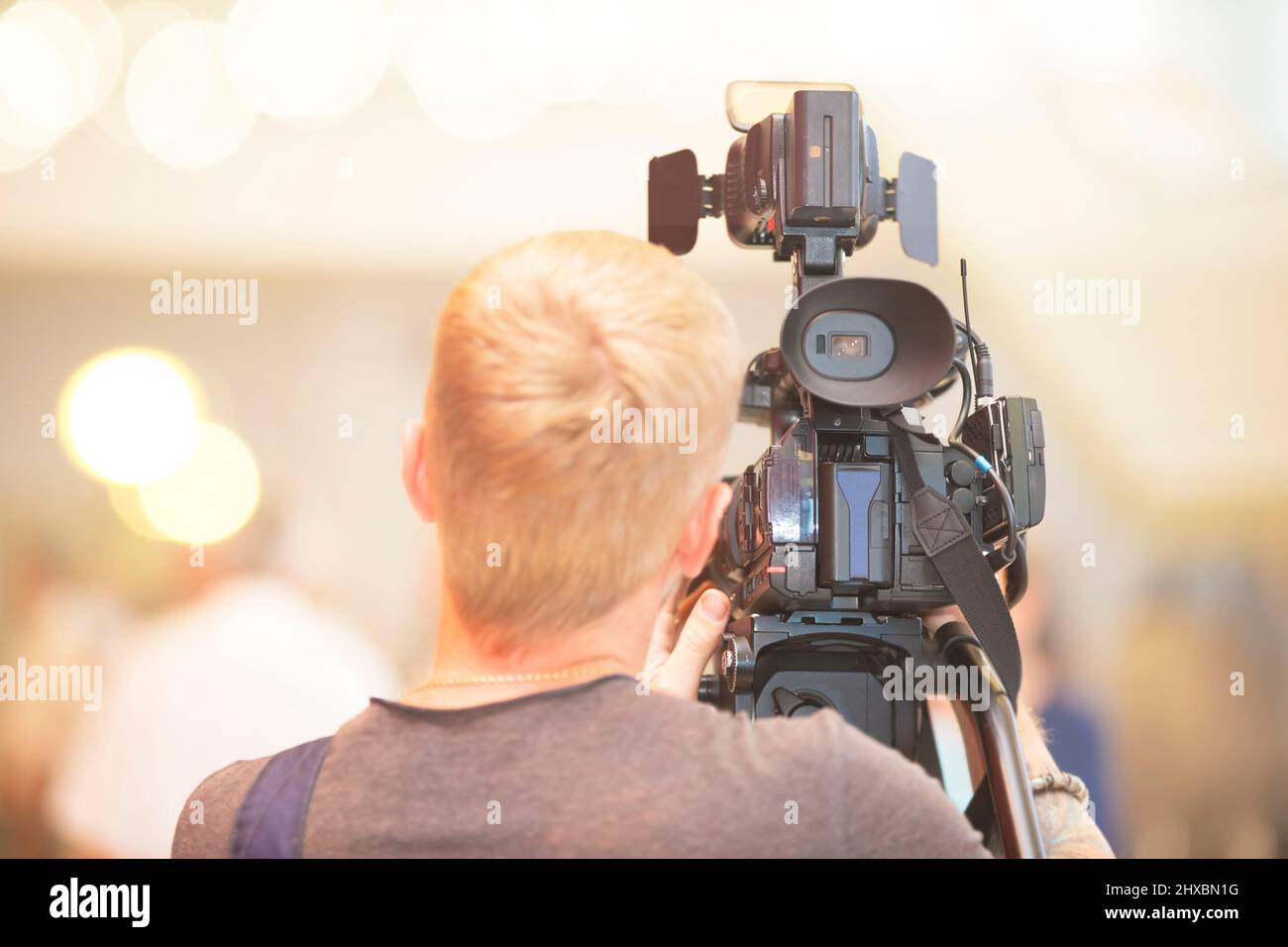 Videographer stands hi-res stock photography and images - Alamy