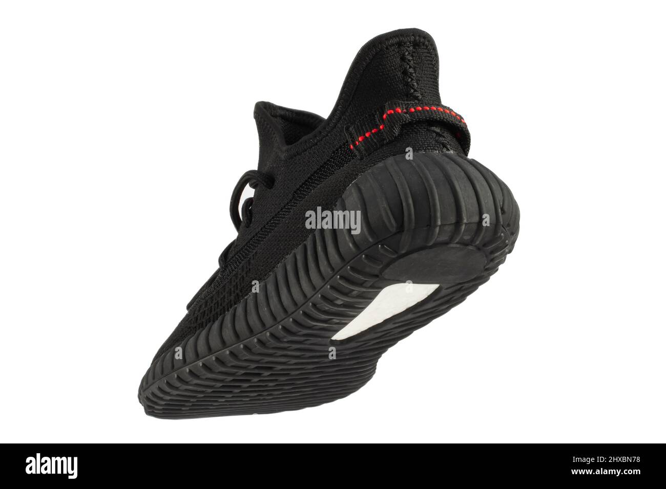 Black rag sneaker on a white background Stock Photo - Alamy