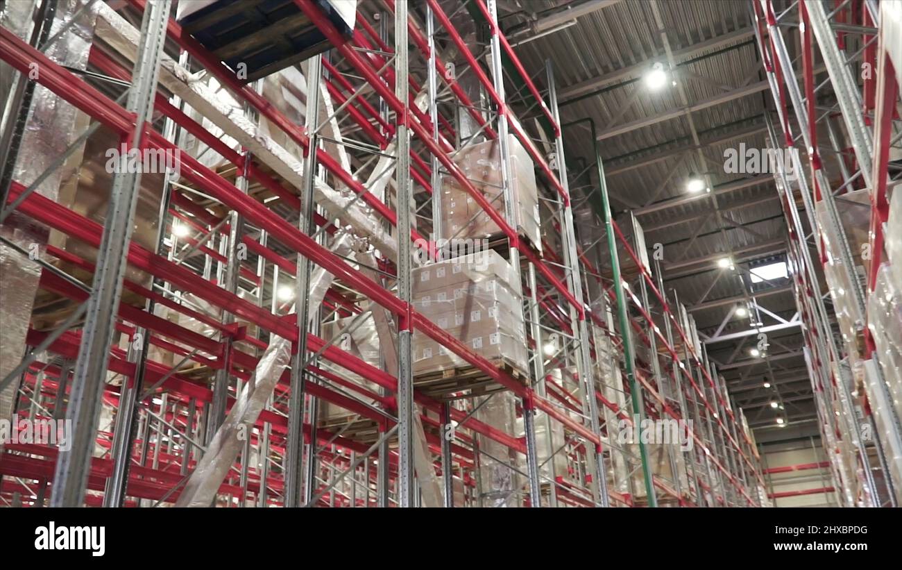 Forklift in the large modern warehouse. warehouse interior with shelves ...