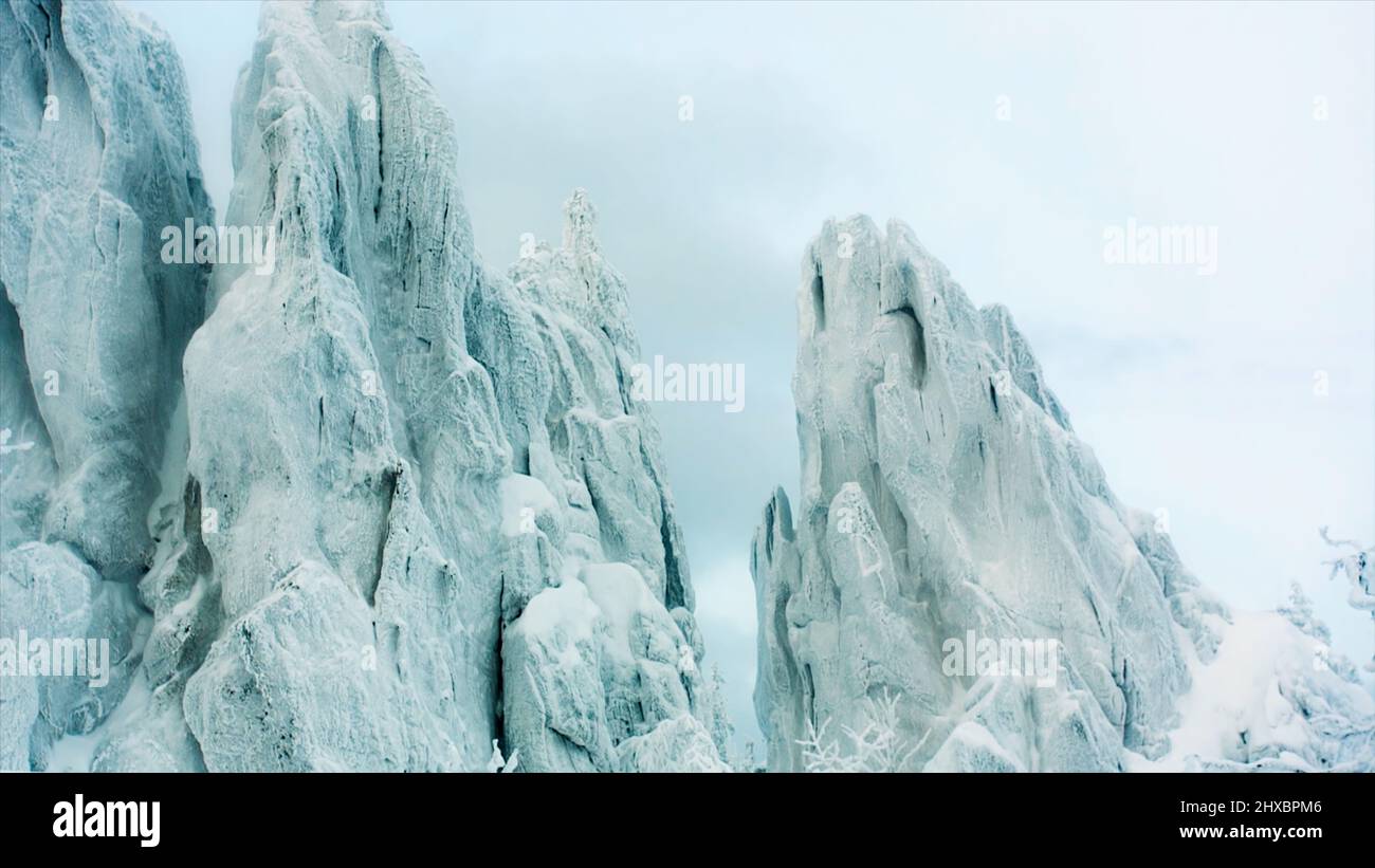 Snowy Rock in the forest. Video. snowy rocks in the mountains with ...