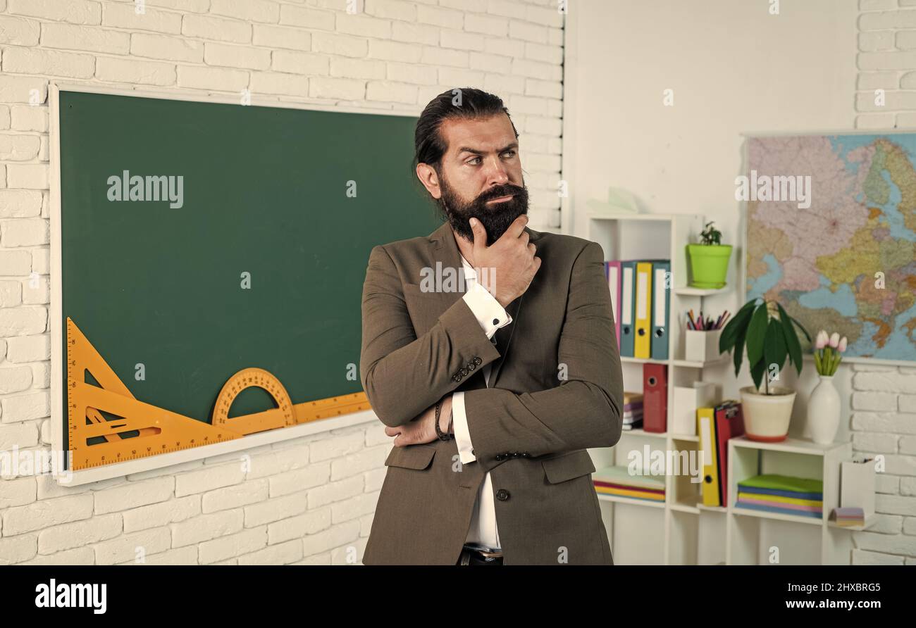 mature bearded man with beard and moustache wear suit in school ...
