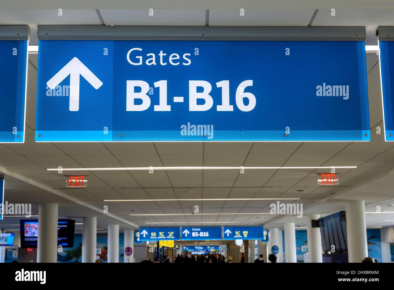 International Airport sign Gates B1- B16 in air terminal Stock Photo ...