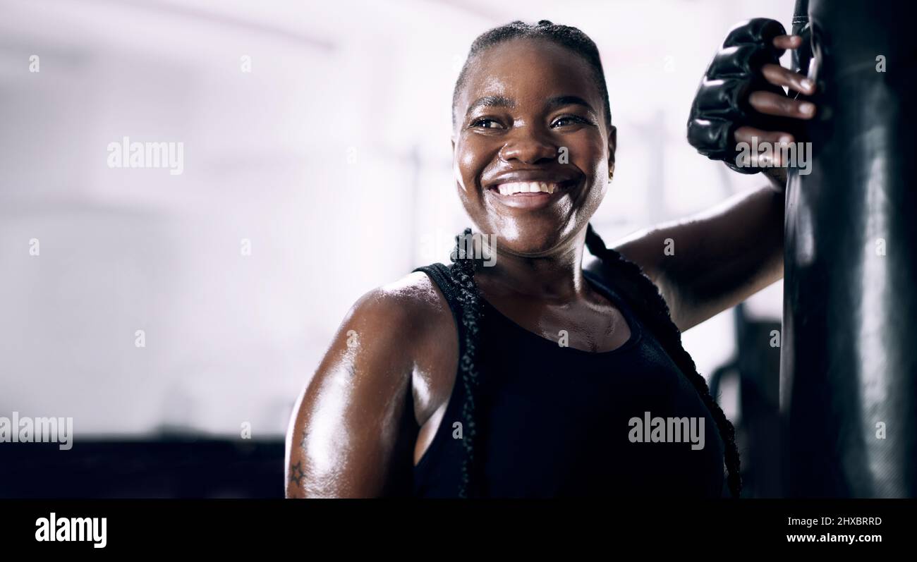 She loves boxing. Cropped shot of an attractive young female athlete ...