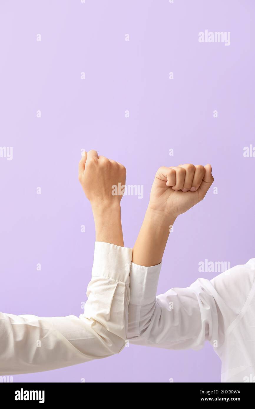 Clenched fists raised arms hi-res stock photography and images - Alamy