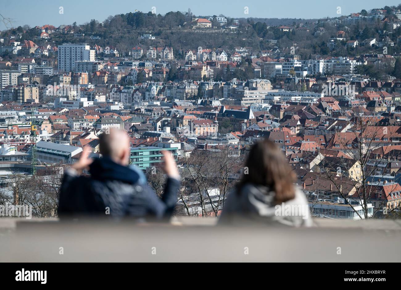 Stuttgart, Germany. 11th Mar, 2022. Two people talking overlooking part ...