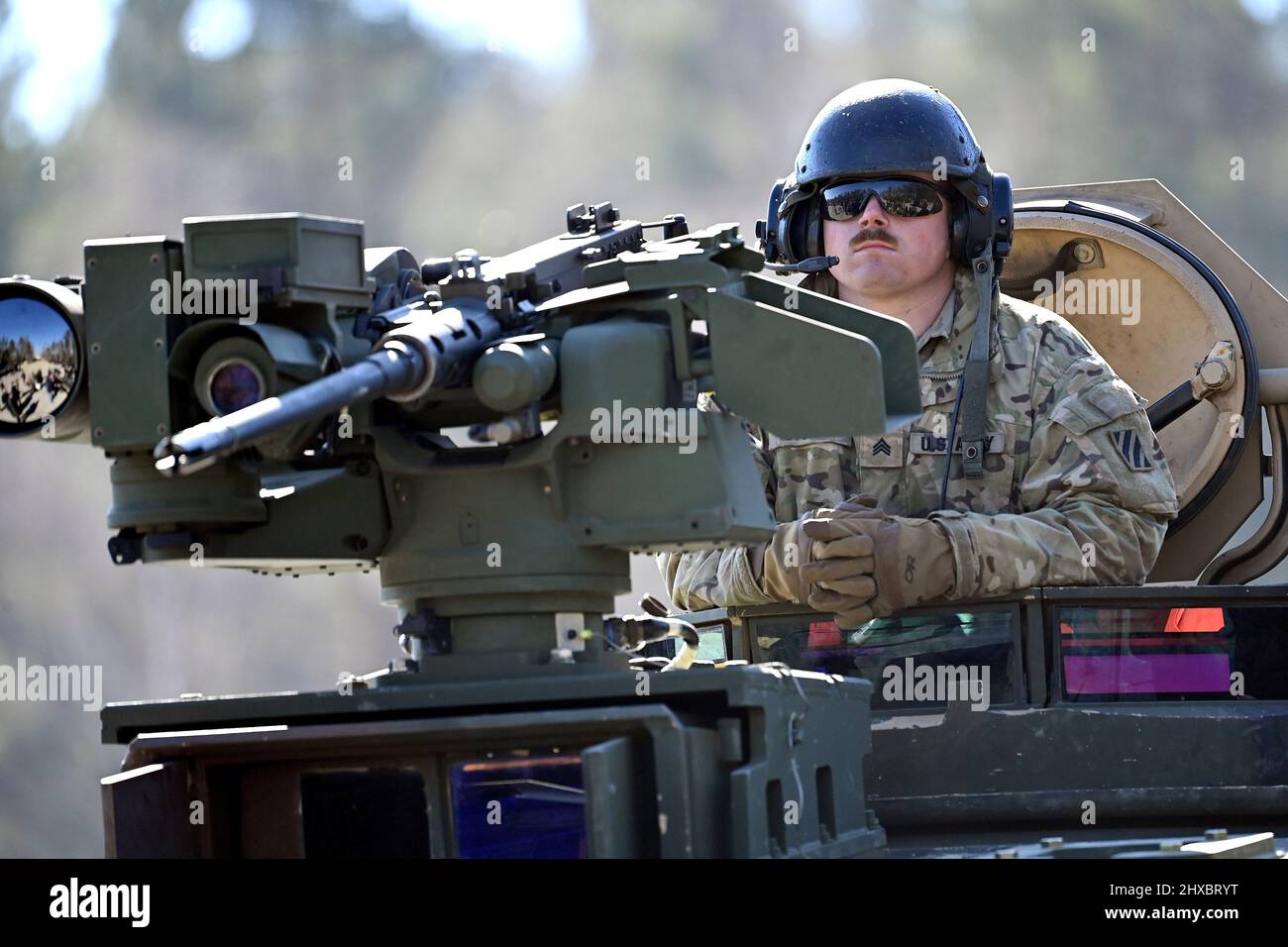 Tank gunner of a US tank sits on the command post. Prime Minister Dr ...