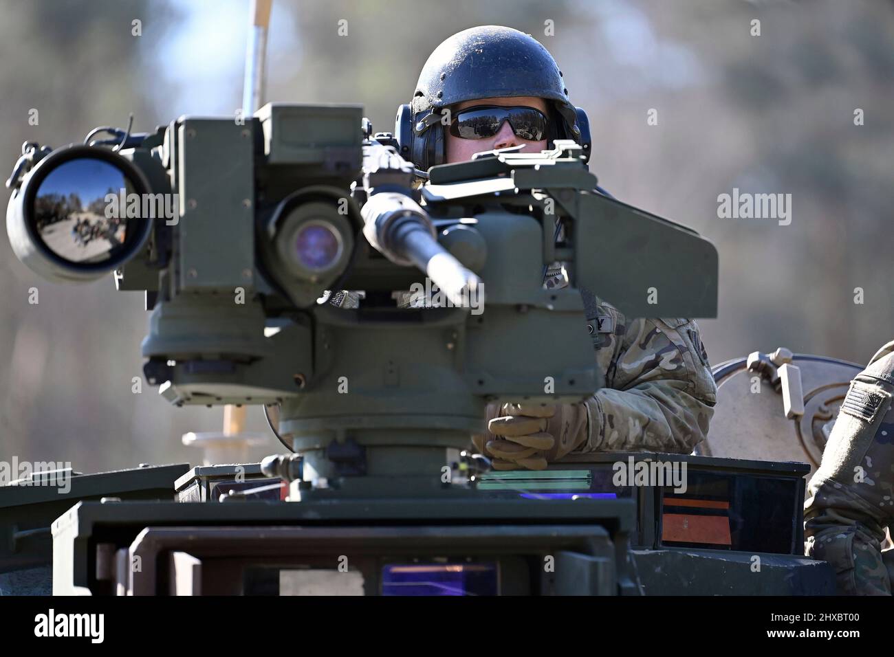 Tank gunner of a US tank sits on the command post. Prime Minister Dr ...