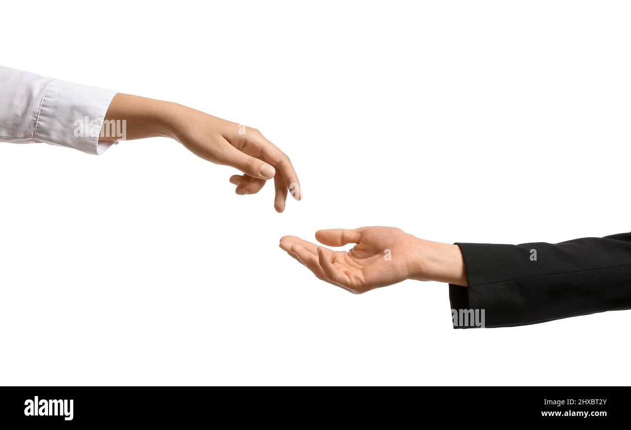 Hands of women on white background Stock Photo - Alamy