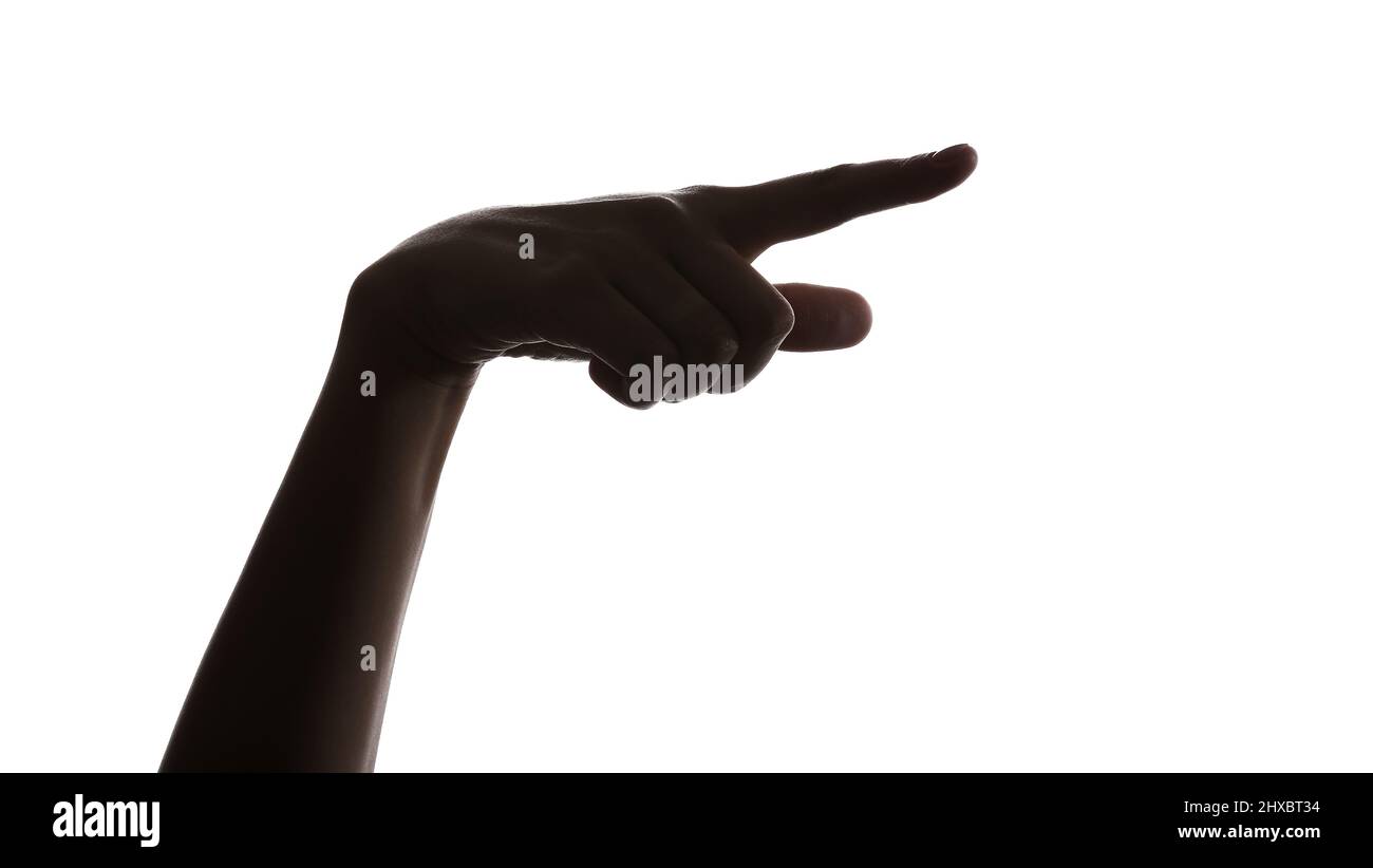 Silhouette of female hand showing something on white background Stock ...