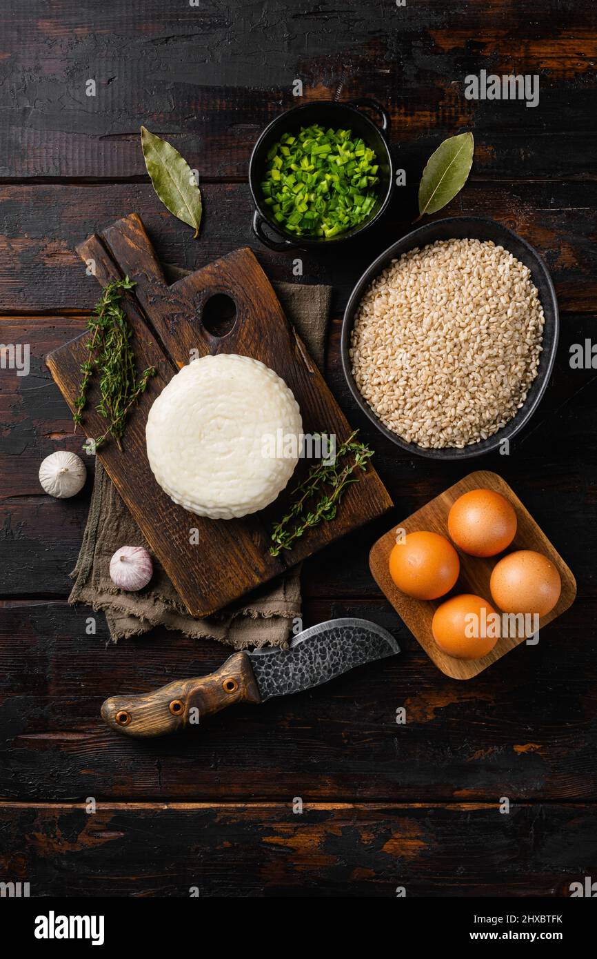 Rice with tofu ingredients, on old dark wooden table background, top ...