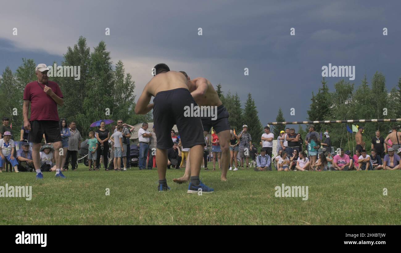 Odinsk, Russia - June 29 2019: Buryat national sport wrestling. Holiday ...