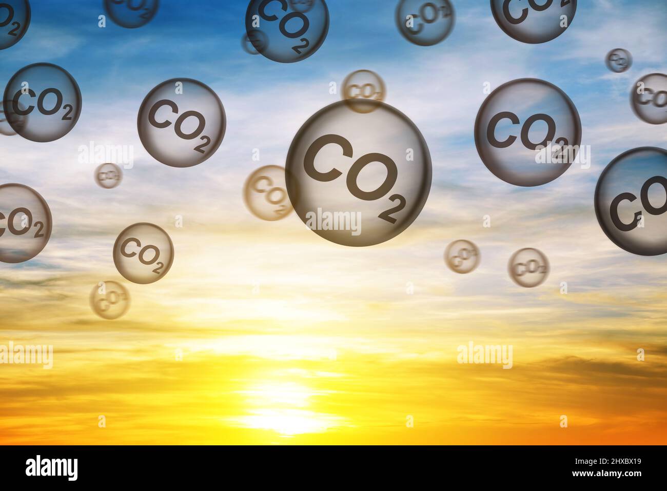 Bubbles with CO2 text at sunset. Global warming or change climate ...