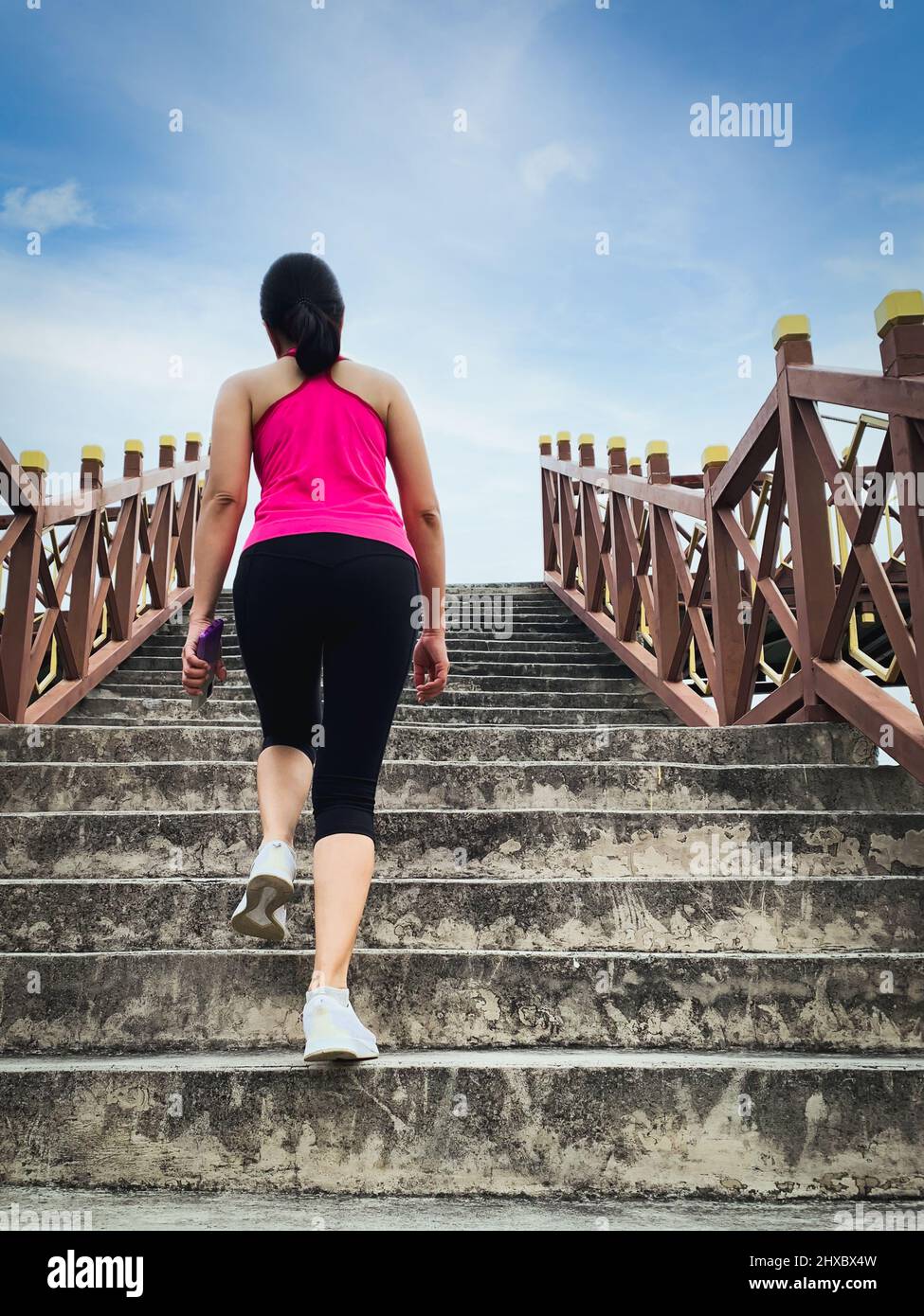 Woman exercise walking up the stairs, Healthy lifestyle concept Stock ...
