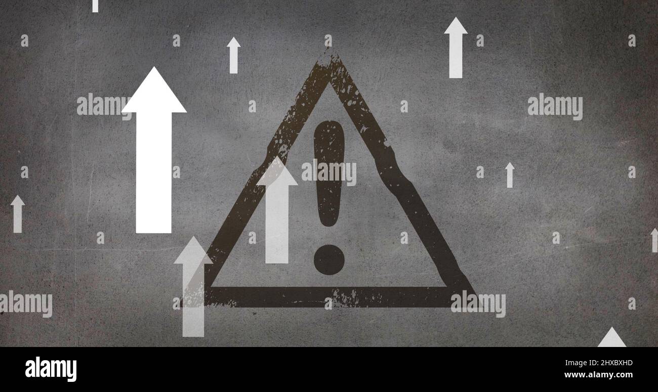 Image of arrows and warning sign on gray background Stock Photo - Alamy