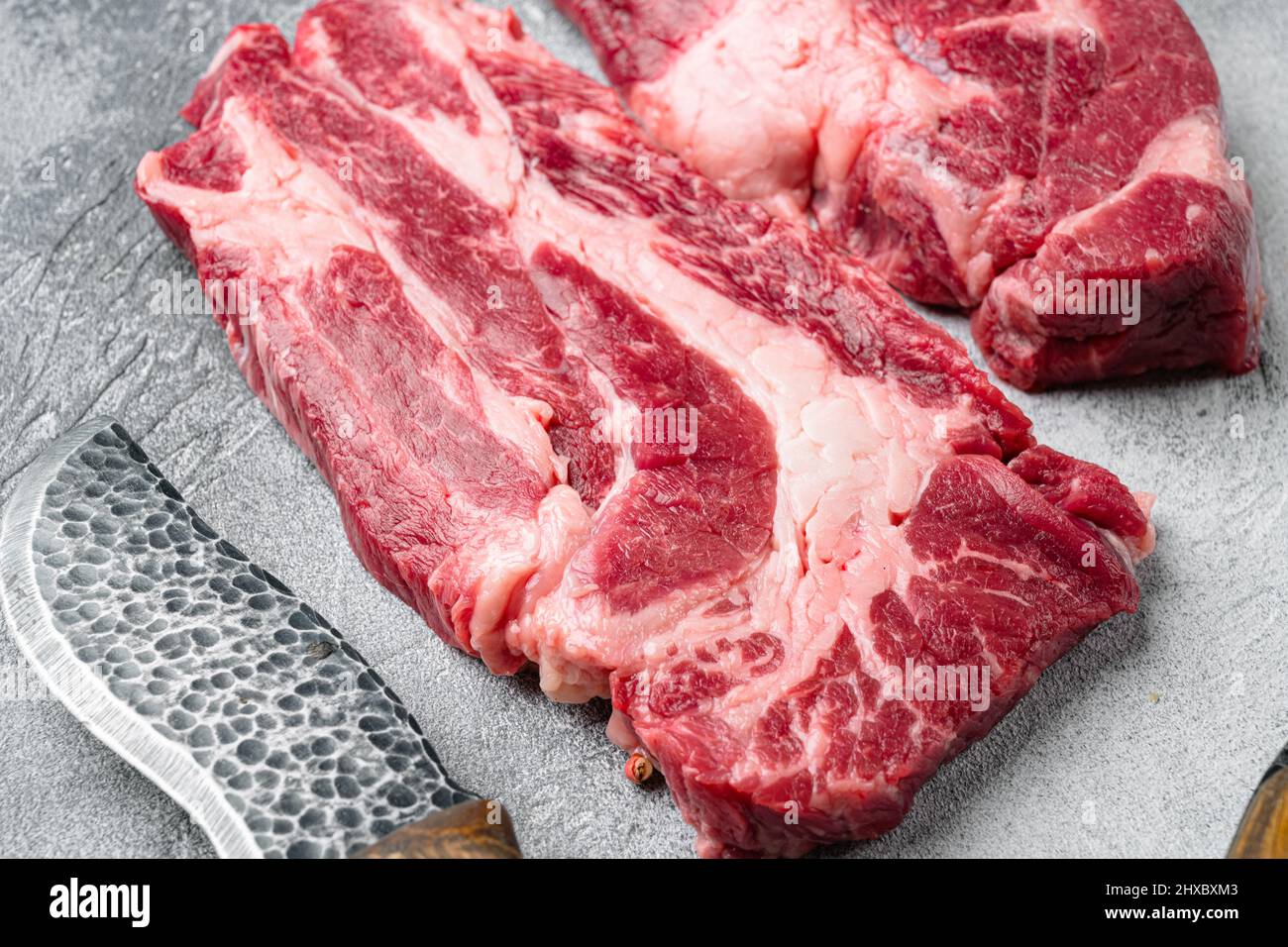 Raw Chuck eye roll steak. Organic beef, on gray stone table background ...