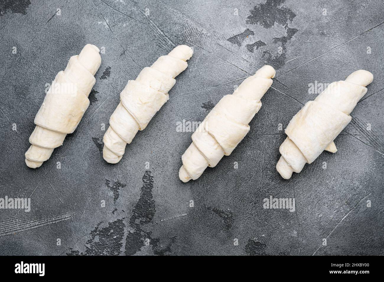 Raw croissant dough, on gray stone table background, top view flat lay ...