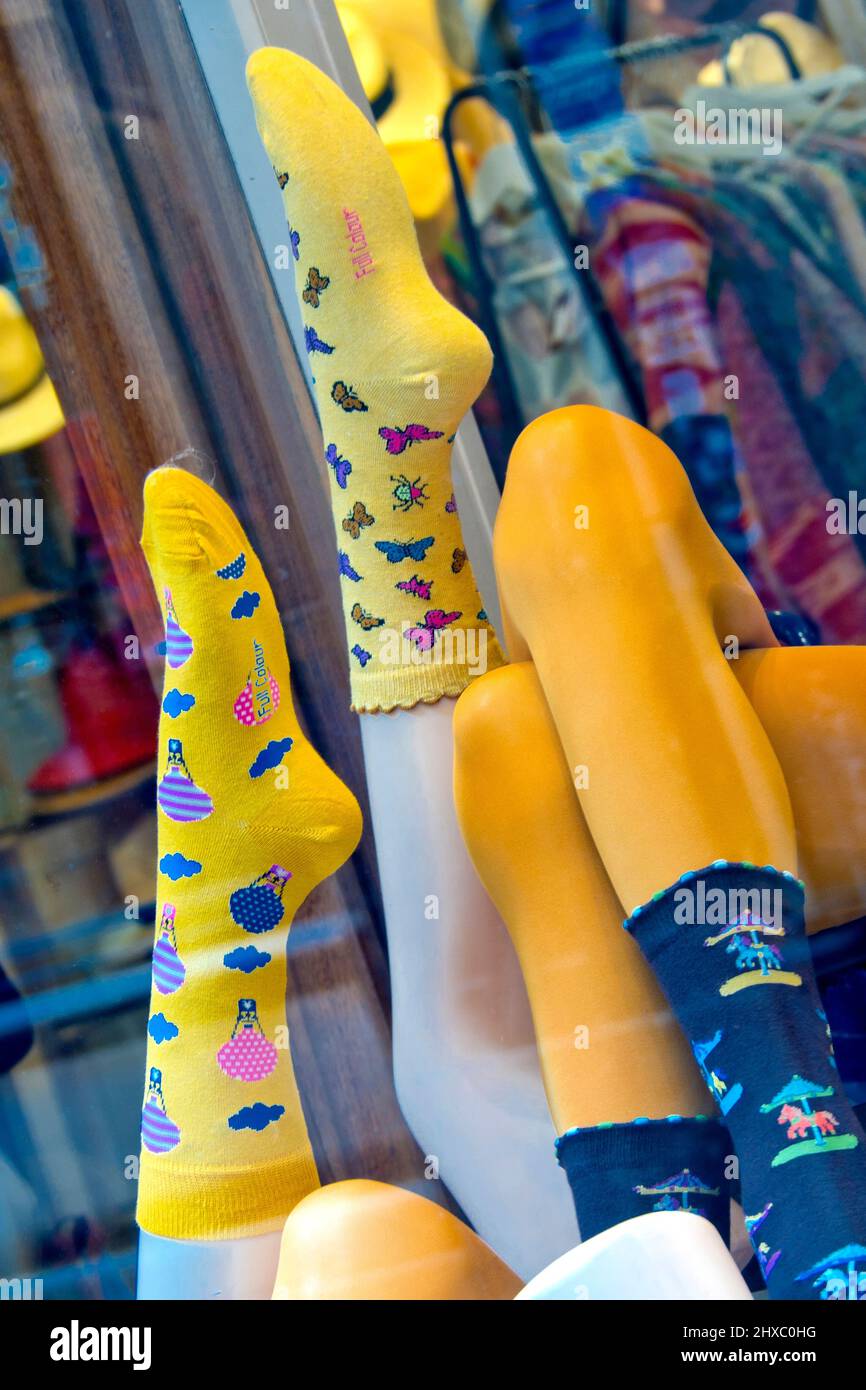 Fashion Shop Window with Yellow Decorated Socks Stock Photo - Alamy