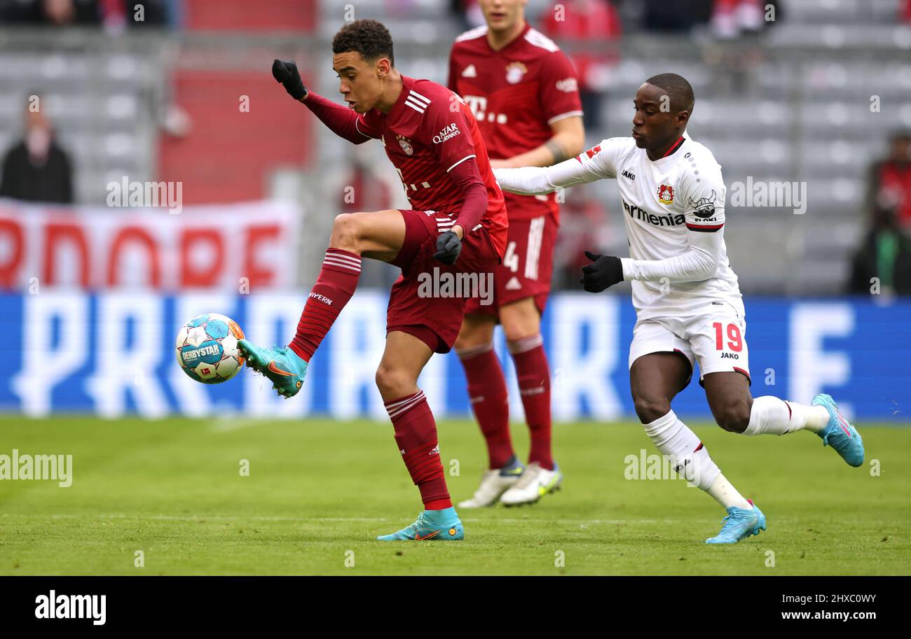 Jamal Musiala of Bayern Muenchen Moussa Diaby of Bayer Leverkusen FC ...