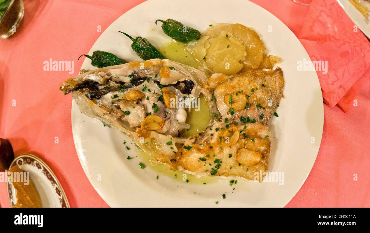 Stewed Sea Bass Spanish Cuisine at Restaurant Stock Photo - Alamy