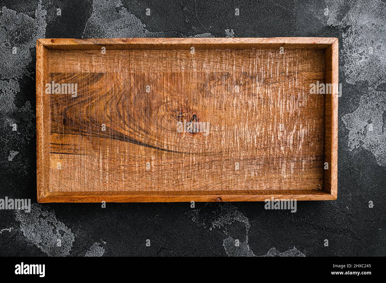 Empty dark wooden box with copy space for text or food, top view flat ...