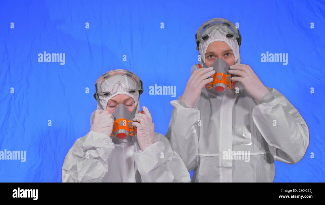 Doctor health worker in respirator. Slow motion. People portrait ...