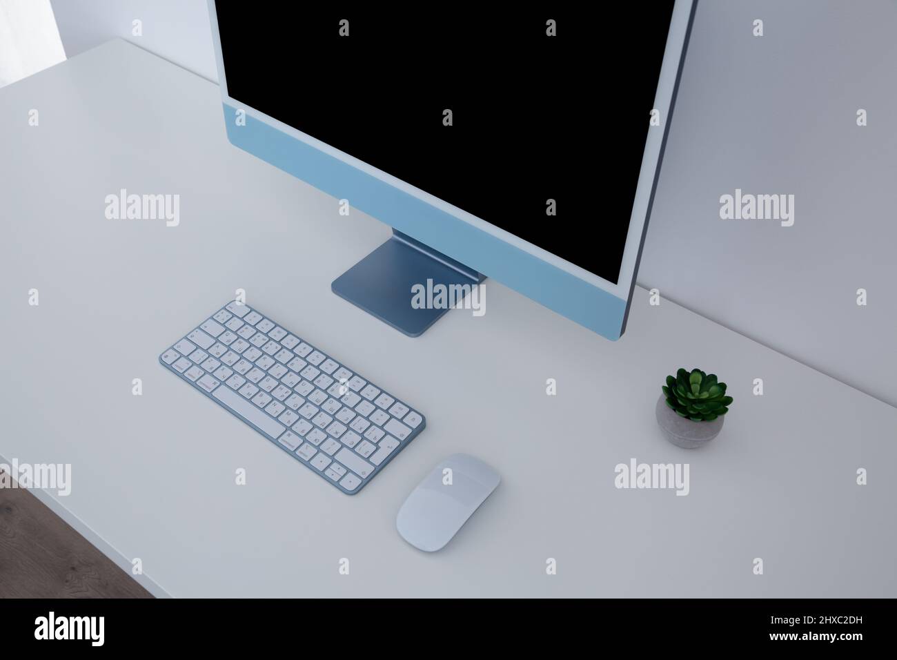 Desktop computer with wireless keyboard and mouse. New model multicolored Apple iMac Stock Photo ...