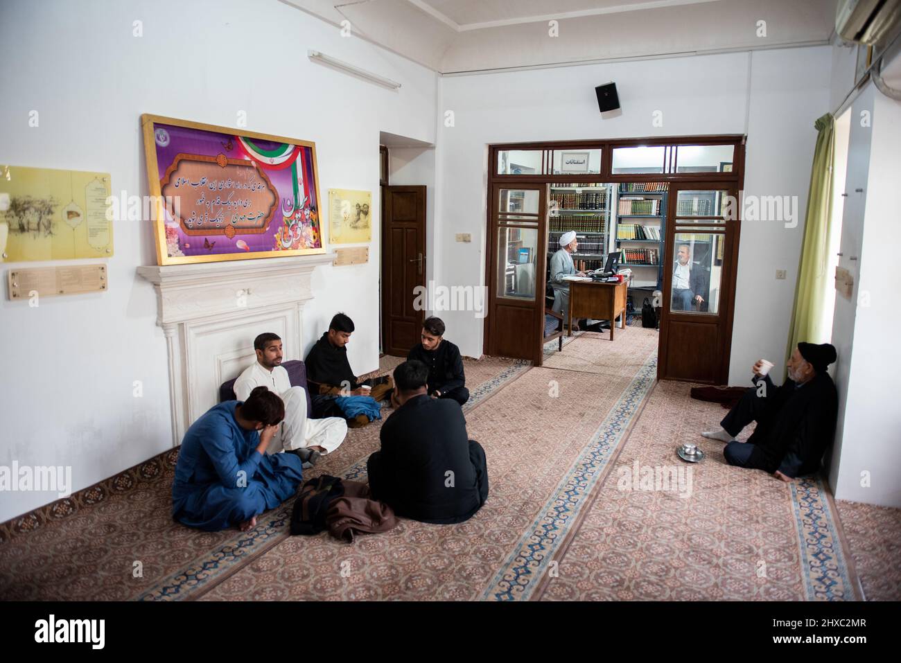 Qom, Iran. 10th Mar, 2022. A group of Pakistani visitors is sitting at ...