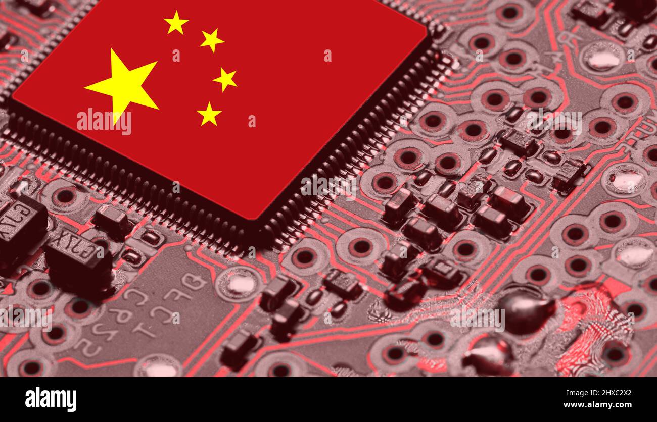 Chinese National Flag overlaid on PC micro chip on integrated circuit ...
