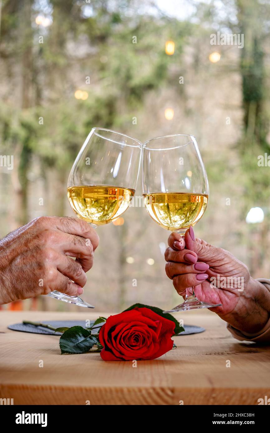Seniors hands toasting hi-res stock photography and images - Alamy