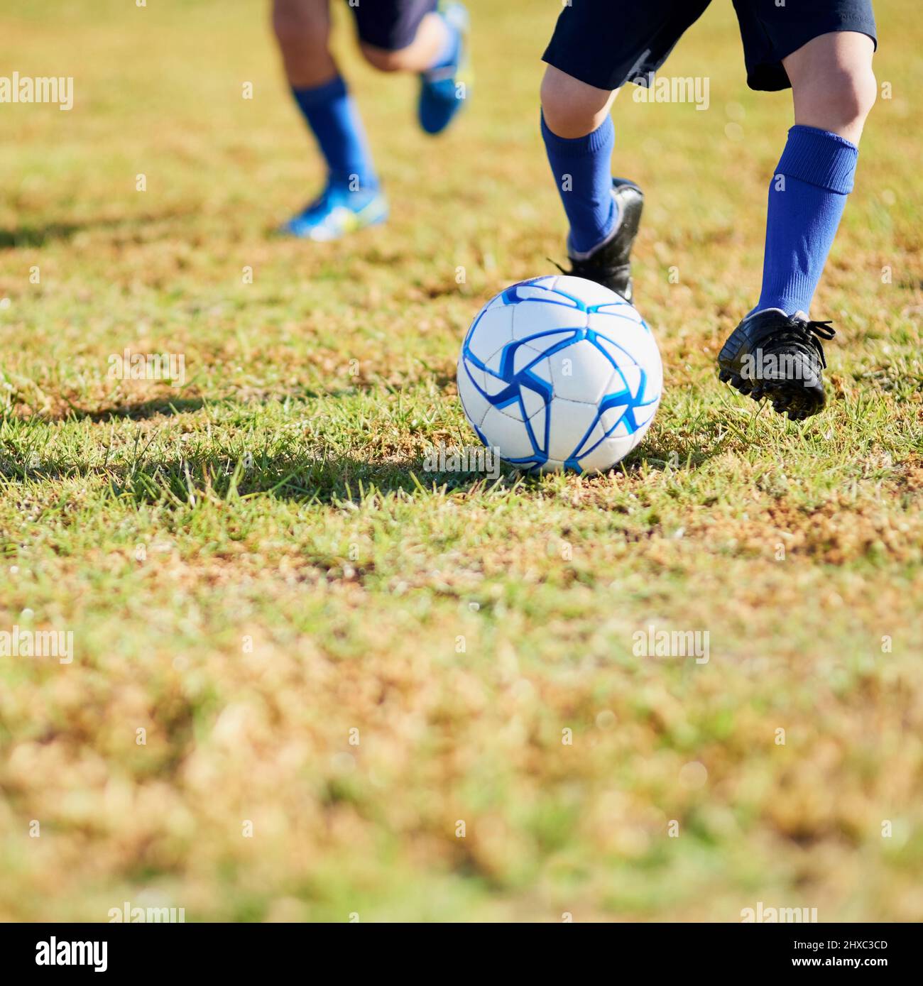 Two friends playing football hi-res stock photography and images - Alamy
