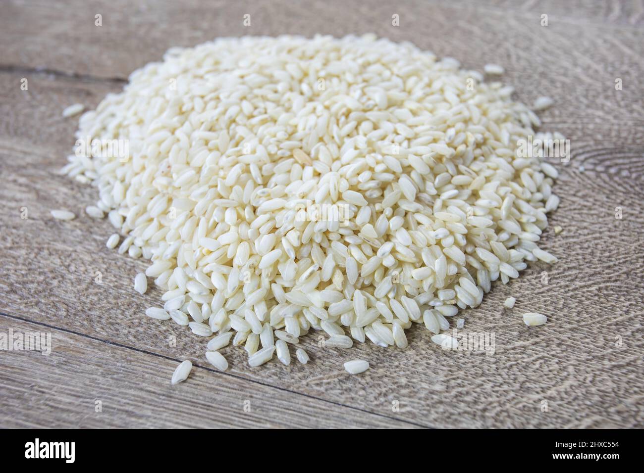 rice isolated on a gray background Stock Photo - Alamy