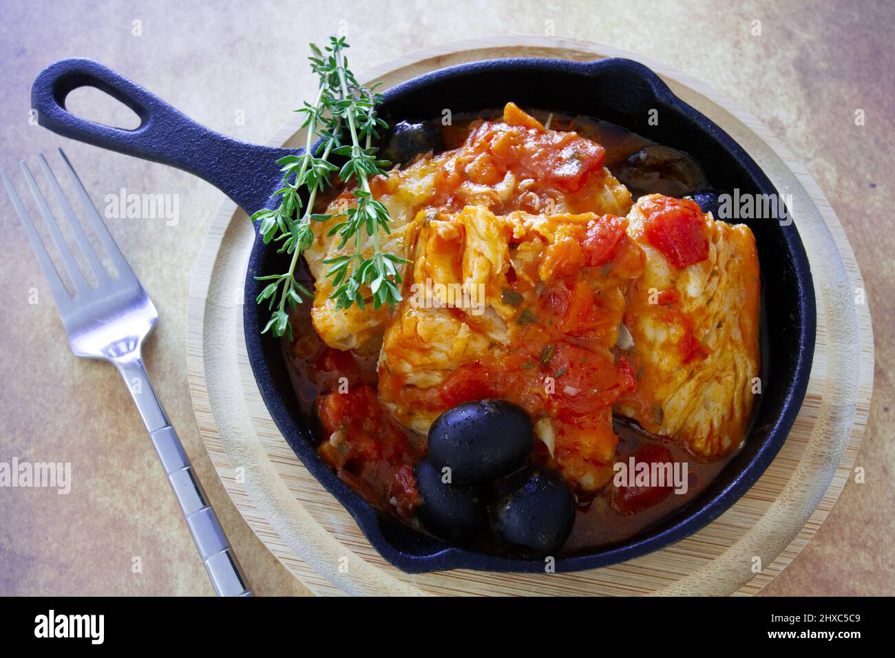 White fish fillet Provencal style Stock Photo - Alamy