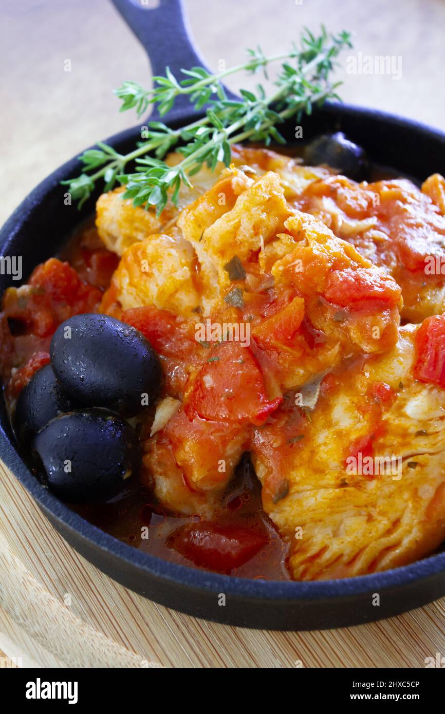 White fish fillet Provencal style Stock Photo - Alamy