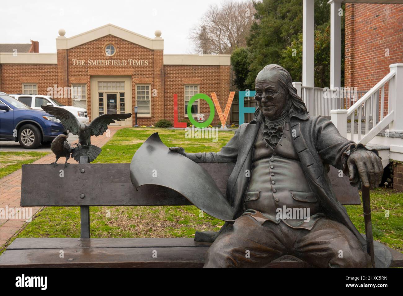 Ben Franklin bronze sculpture sitting on bench in Smithfield Virginia ...