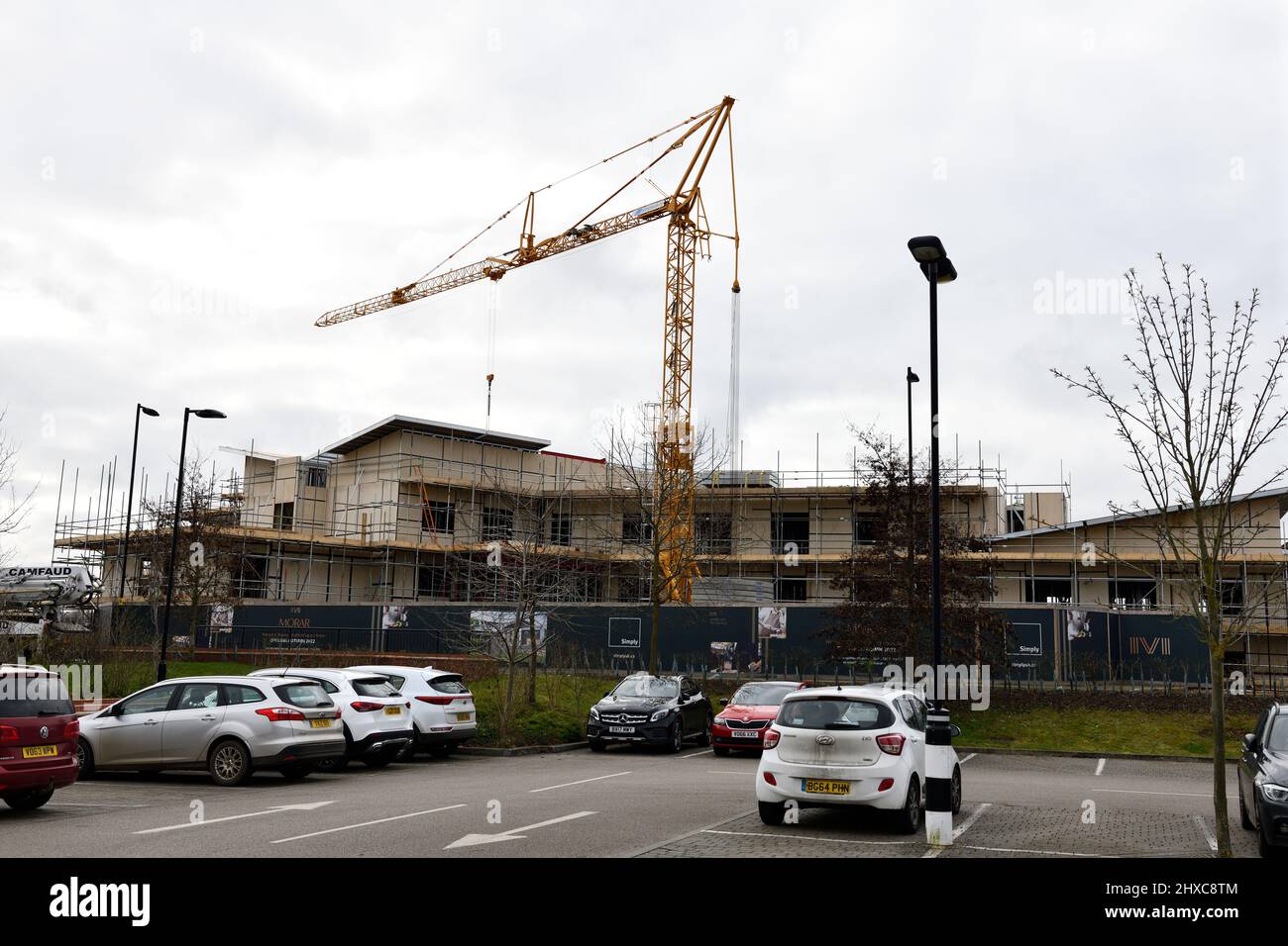 Crane working on Building Site Stock Photo - Alamy