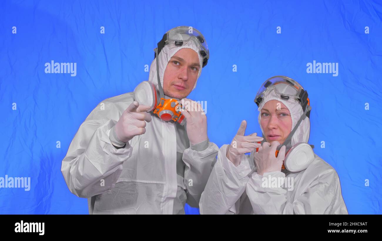 Doctor health worker in respirator. Slow motion. People portrait ...
