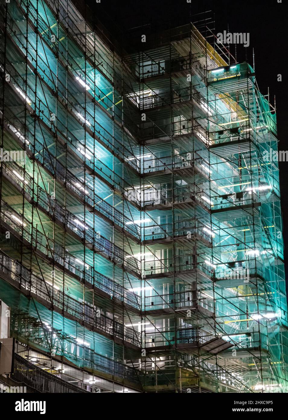 Scaffolding lit up at Night in Edinburgh Stock Photo - Alamy
